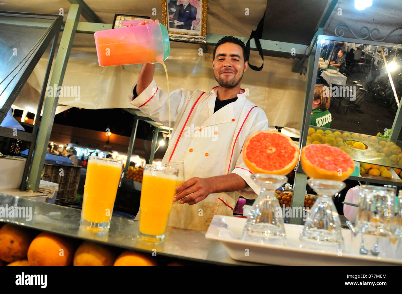 Juice seller in the Place Djemma el-Fna, Square of the hanged, imposter ...