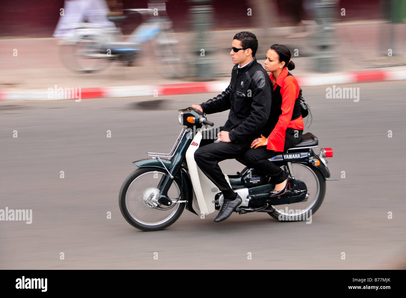 Couple on a moped, Marrakech, Morocco, Africa Stock Photo - Alamy