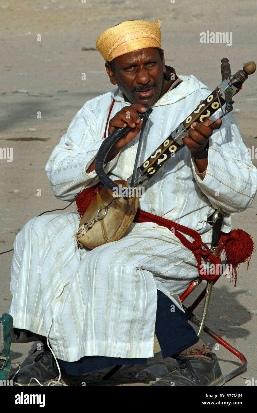 Moroccan Musician in traditional costume during a performance, Morocco ...