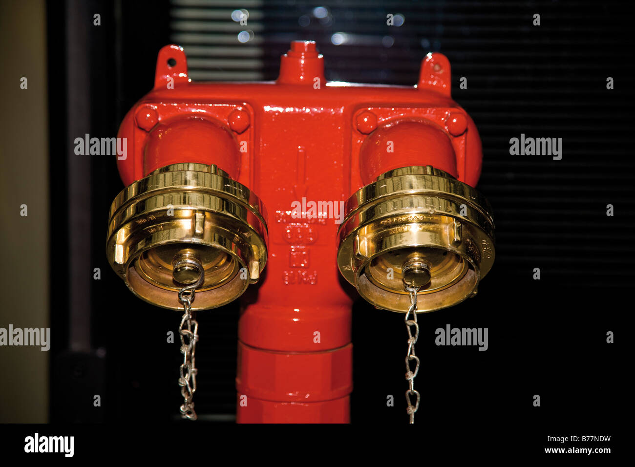 Red coloured Hydrant, close-up Stock Photo - Alamy