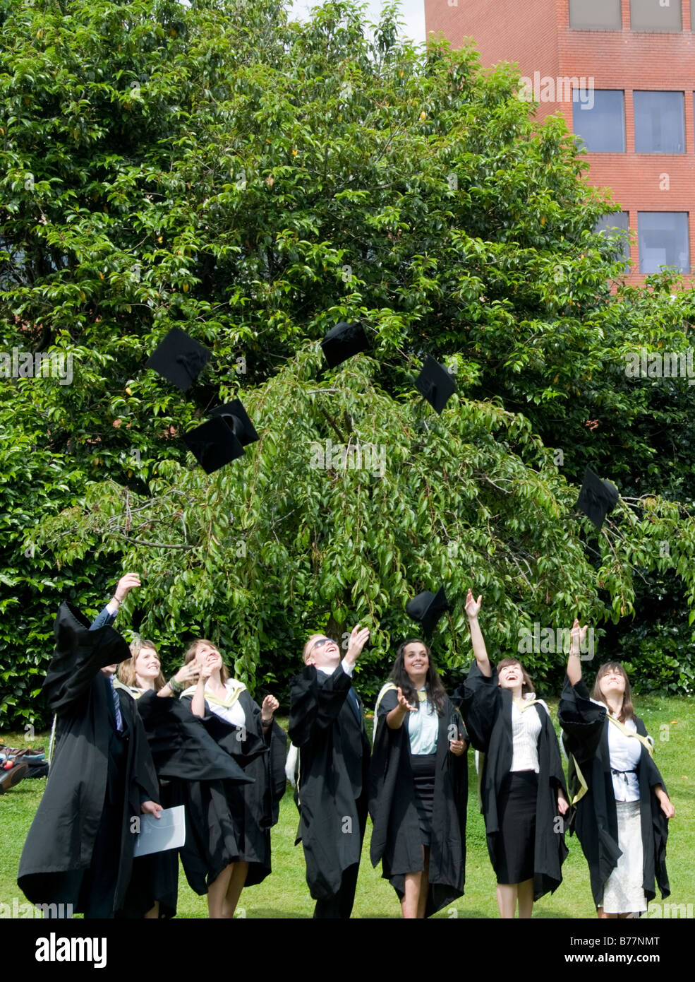 Sheffield University students throwing hats in the air on Graduation ...