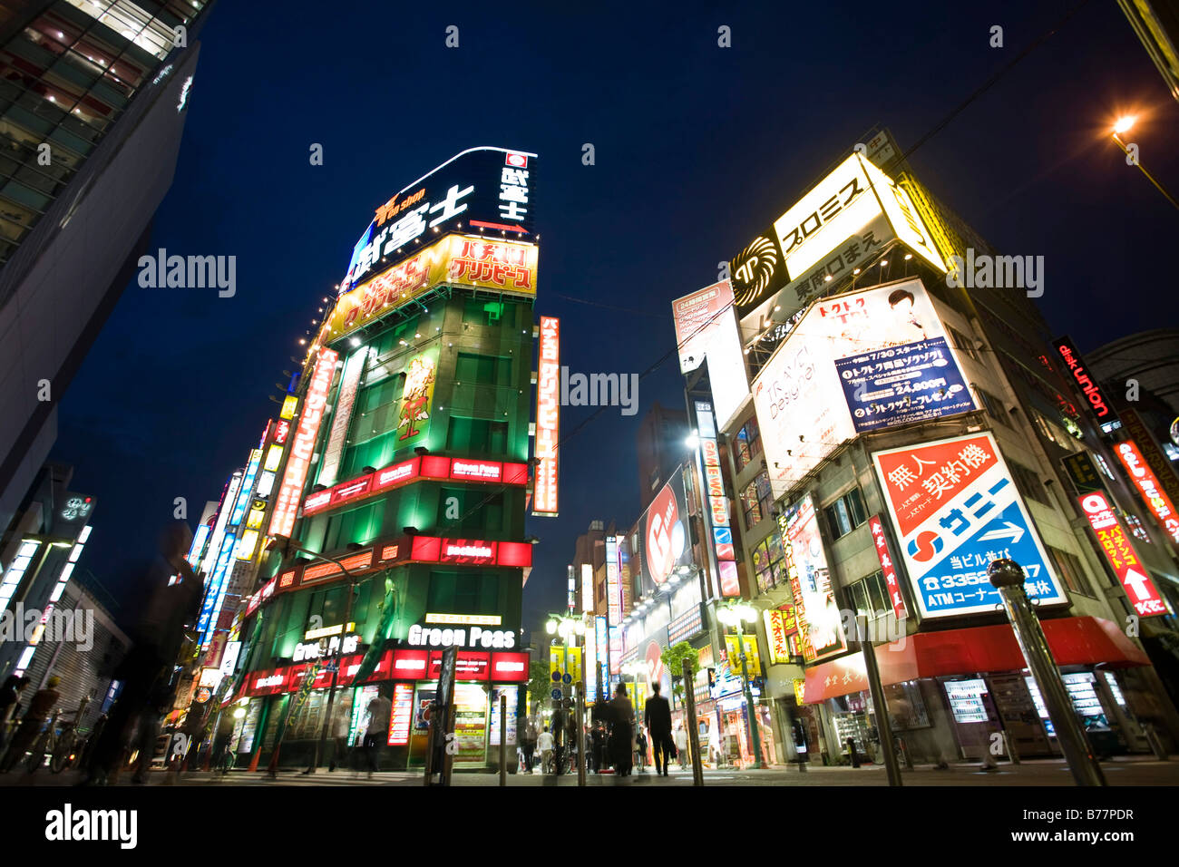 Buildings with neon signage at night, Tokyo, Japan, Asia Stock Photo ...