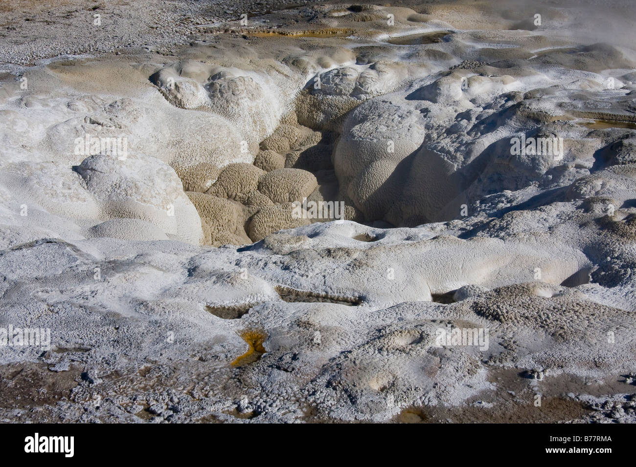 Interesting textures and rock formations surrounding a geyser vent in ...