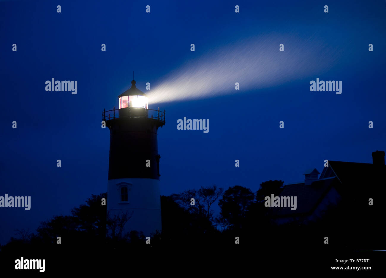 Nauset Light shines during a stormy night Cape Cod National Seashore ...