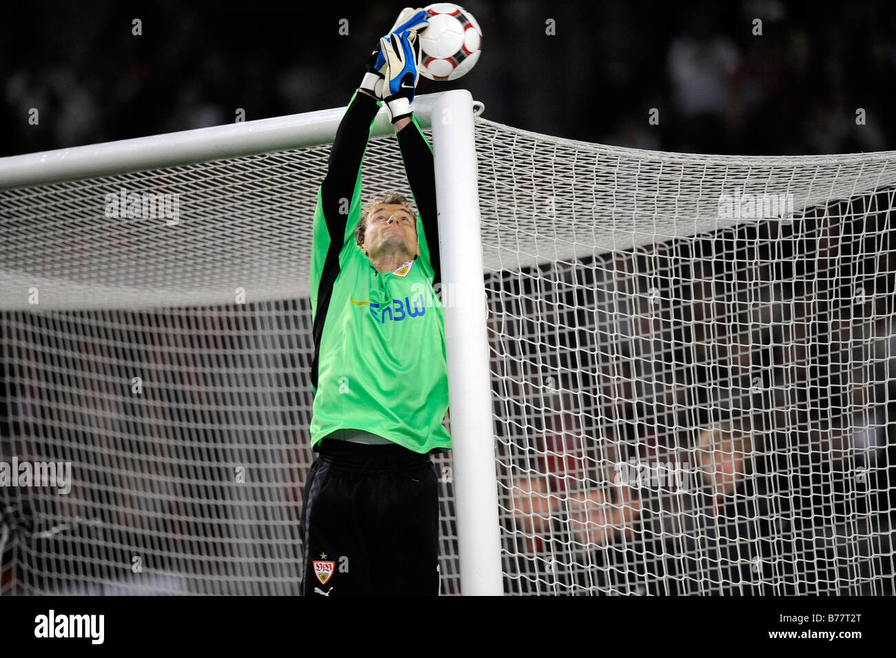 Goalkeeper Jens LEHMANN, VfB Stuttgart, diverting the ball over the ...