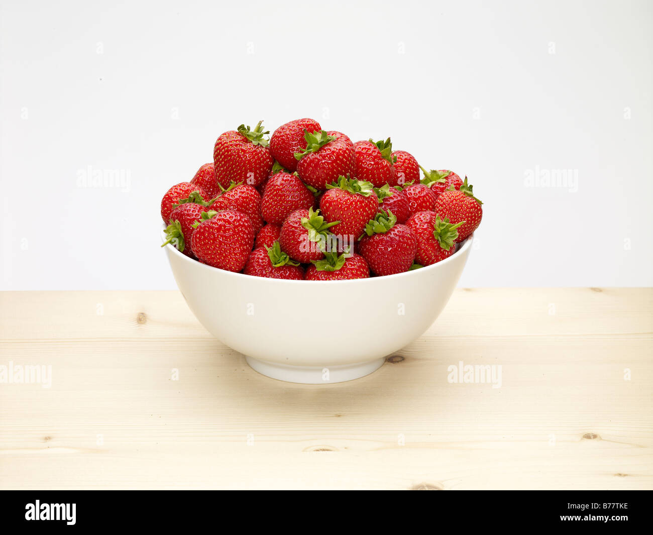 Strawberry white bowl strawberries hi-res stock photography and images ...