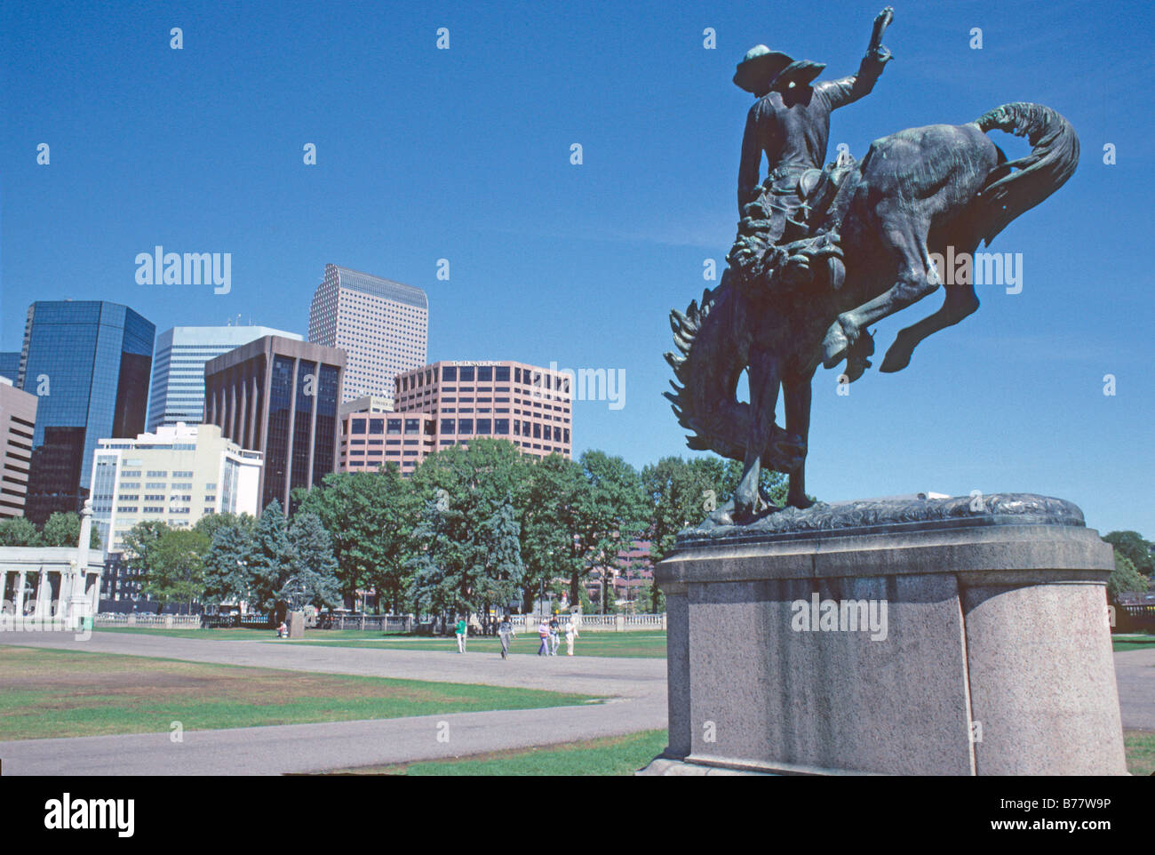 Bronco rider statue with Denver skyline behind Colorado Stock Photo - Alamy