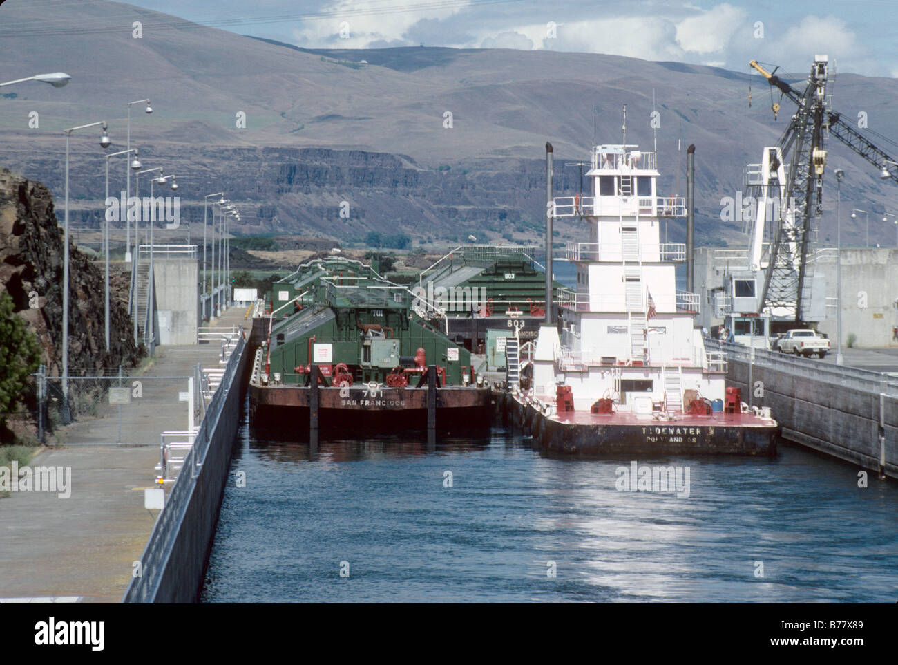 The Dalles Dam tug and barge in locks Columbia River Washington Stock ...
