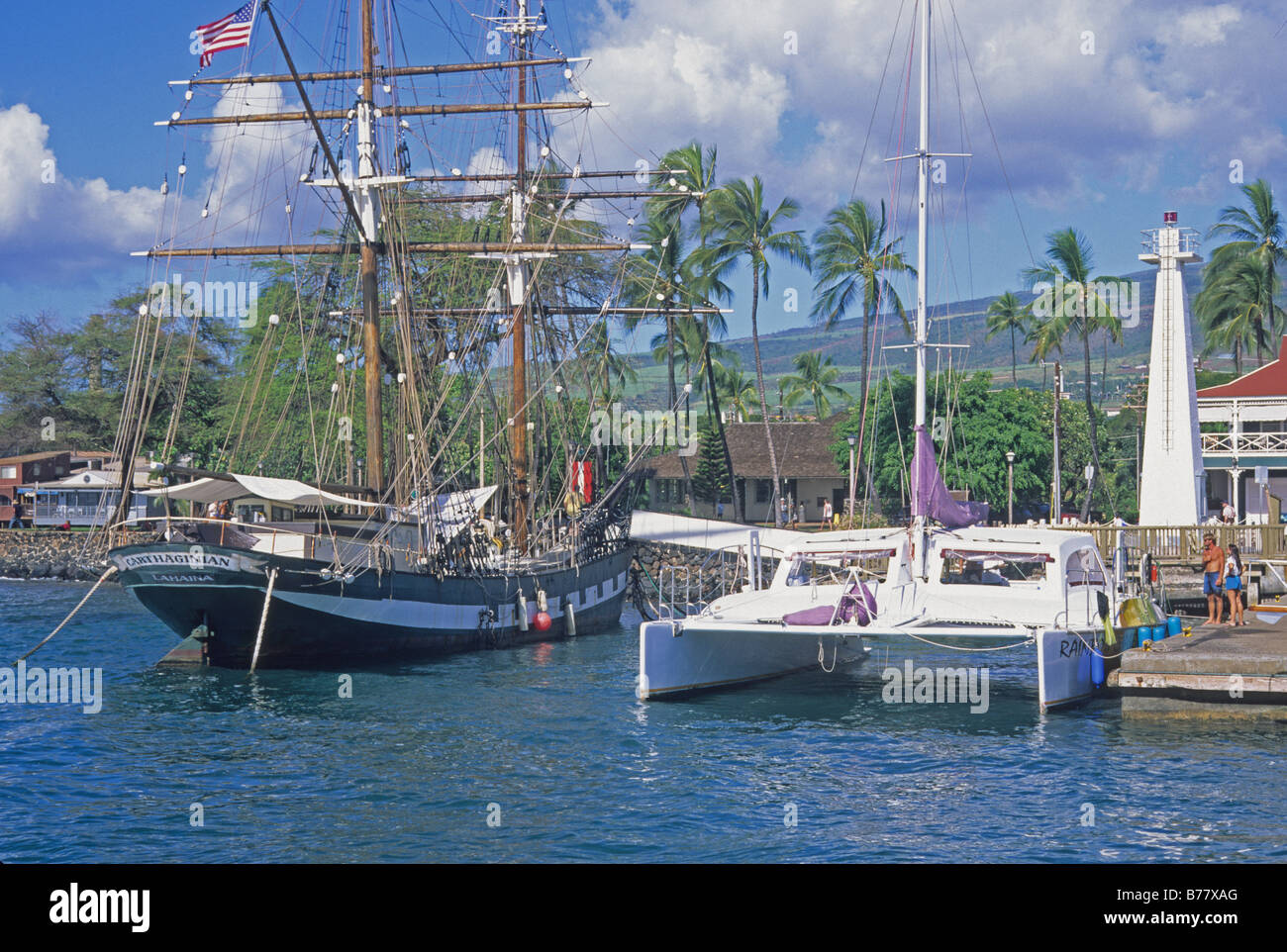 historic ship Carthaginian and charter catamaran in harbor Lahaina Maui ...