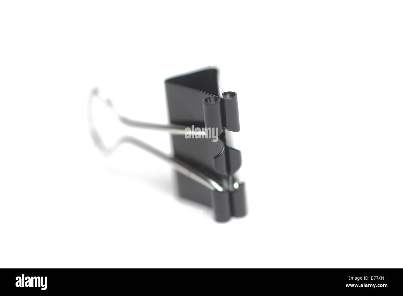 Binder clip, close-up, studio shot, white background Stock Photo - Alamy