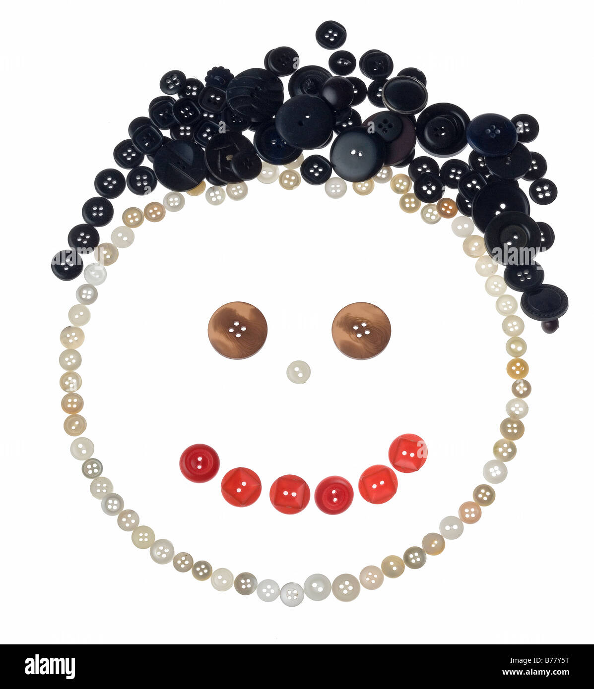 Happy Face made from antique buttons Stock Photo - Alamy