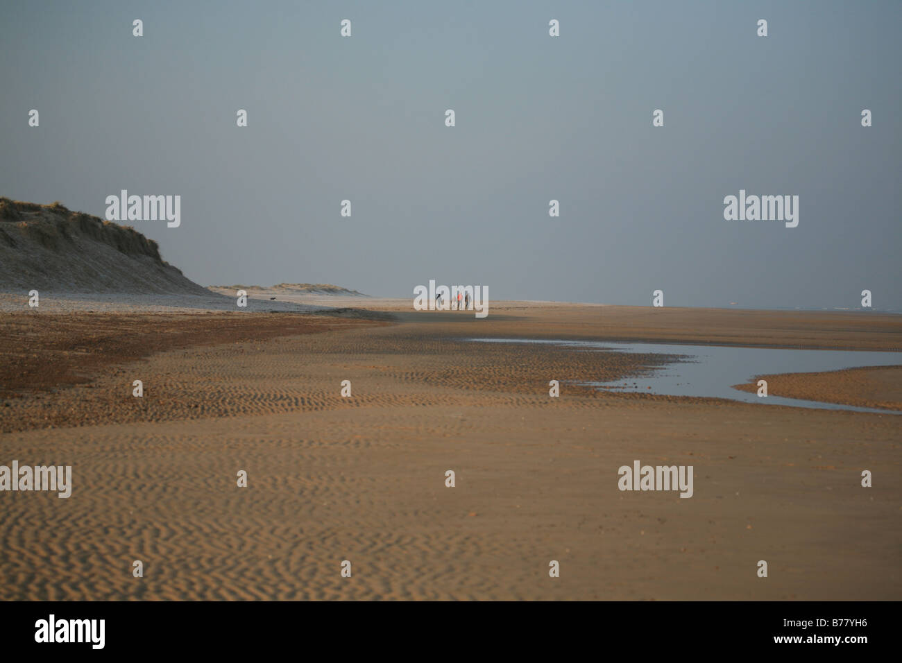 Walking on Winter Beach Stock Photo - Alamy