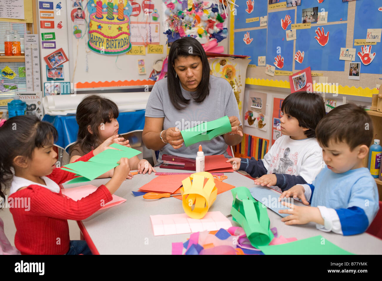 preschool teacher with students Stock Photo - Alamy