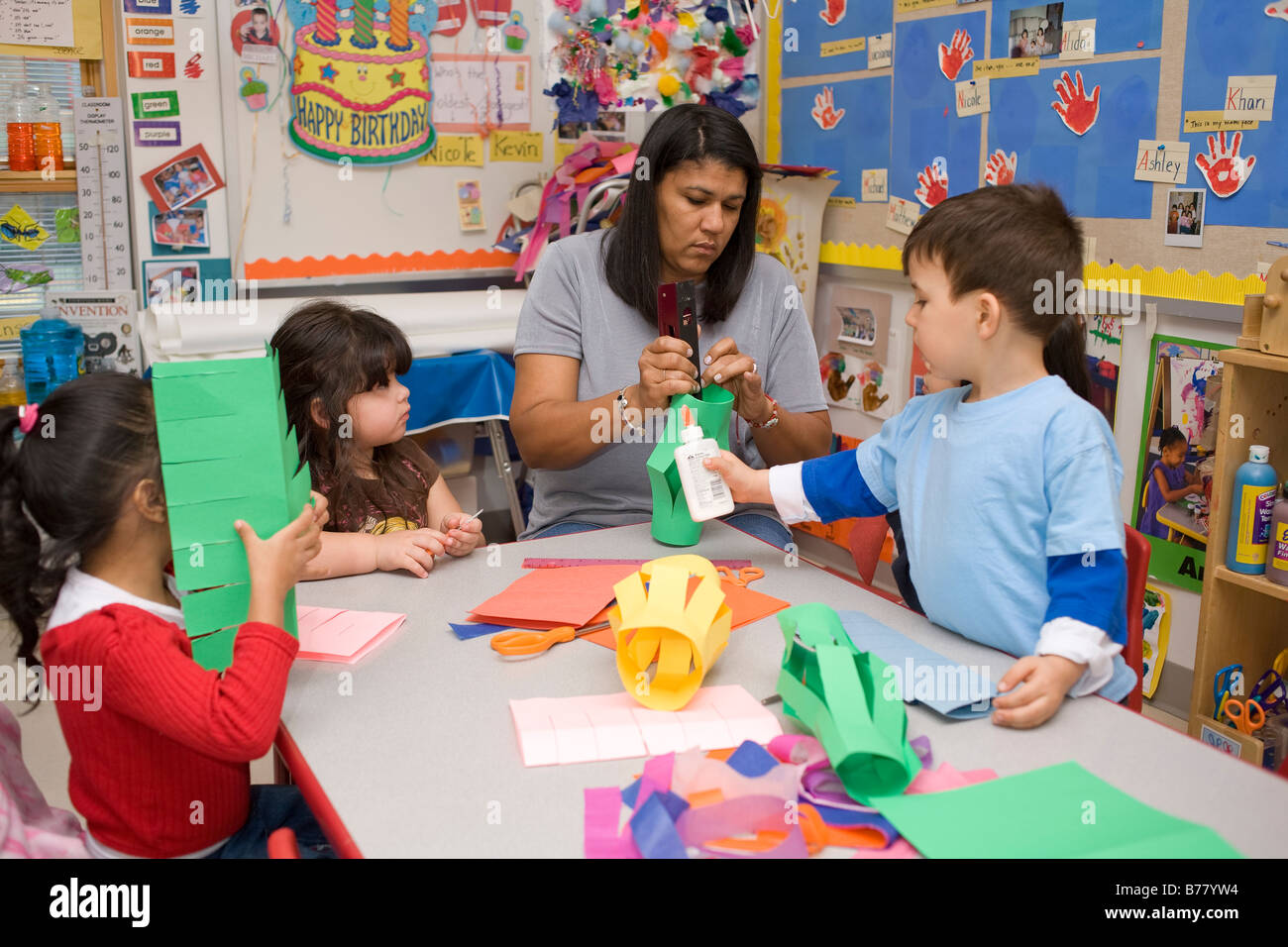 preschool teacher with students Stock Photo - Alamy