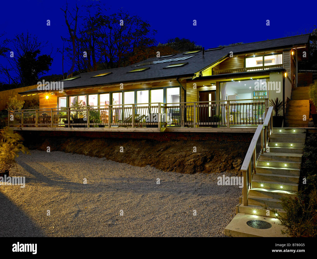Exterior of modern house at night Stock Photo - Alamy