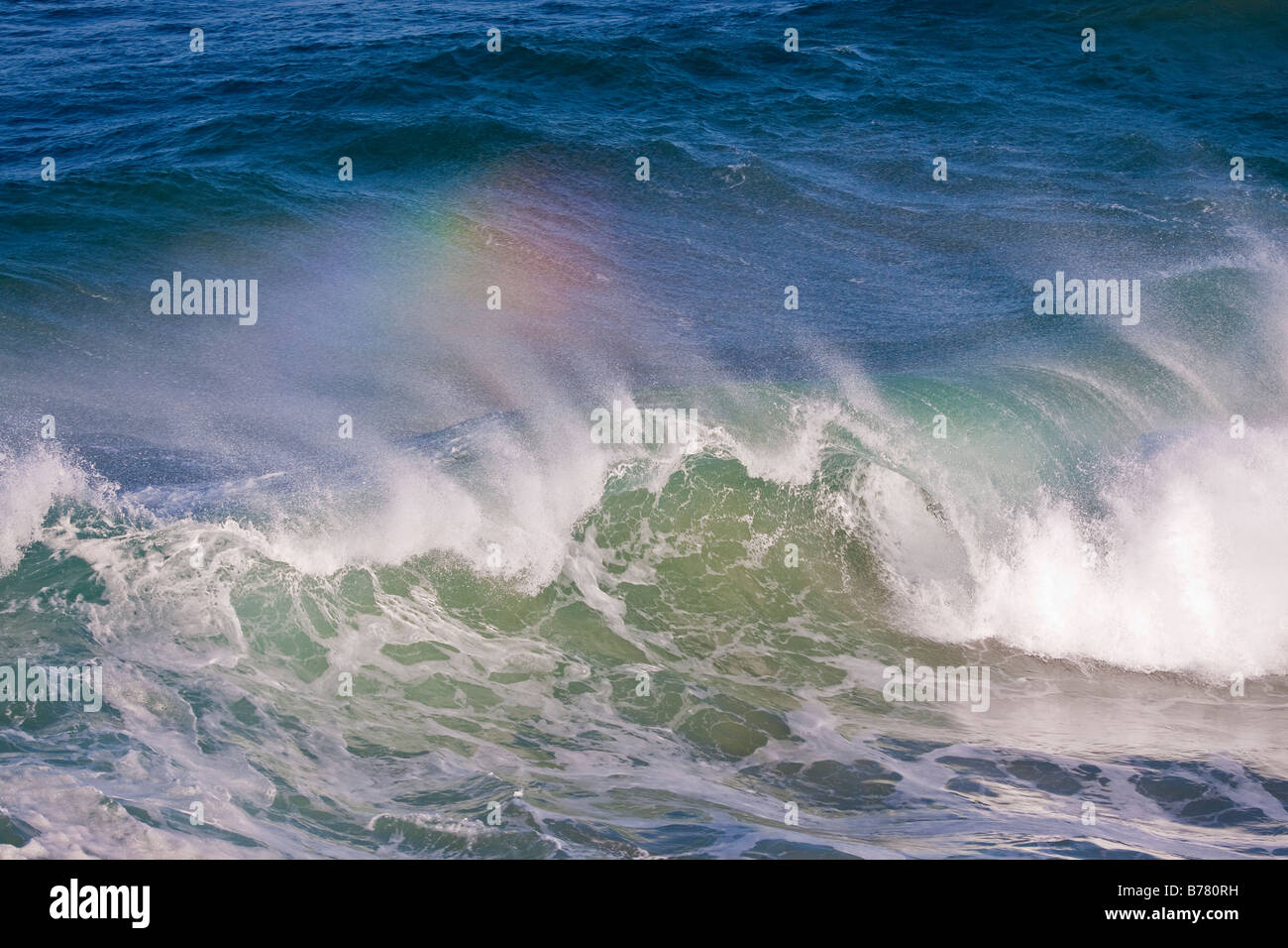 Waves and rainbow Stock Photo - Alamy