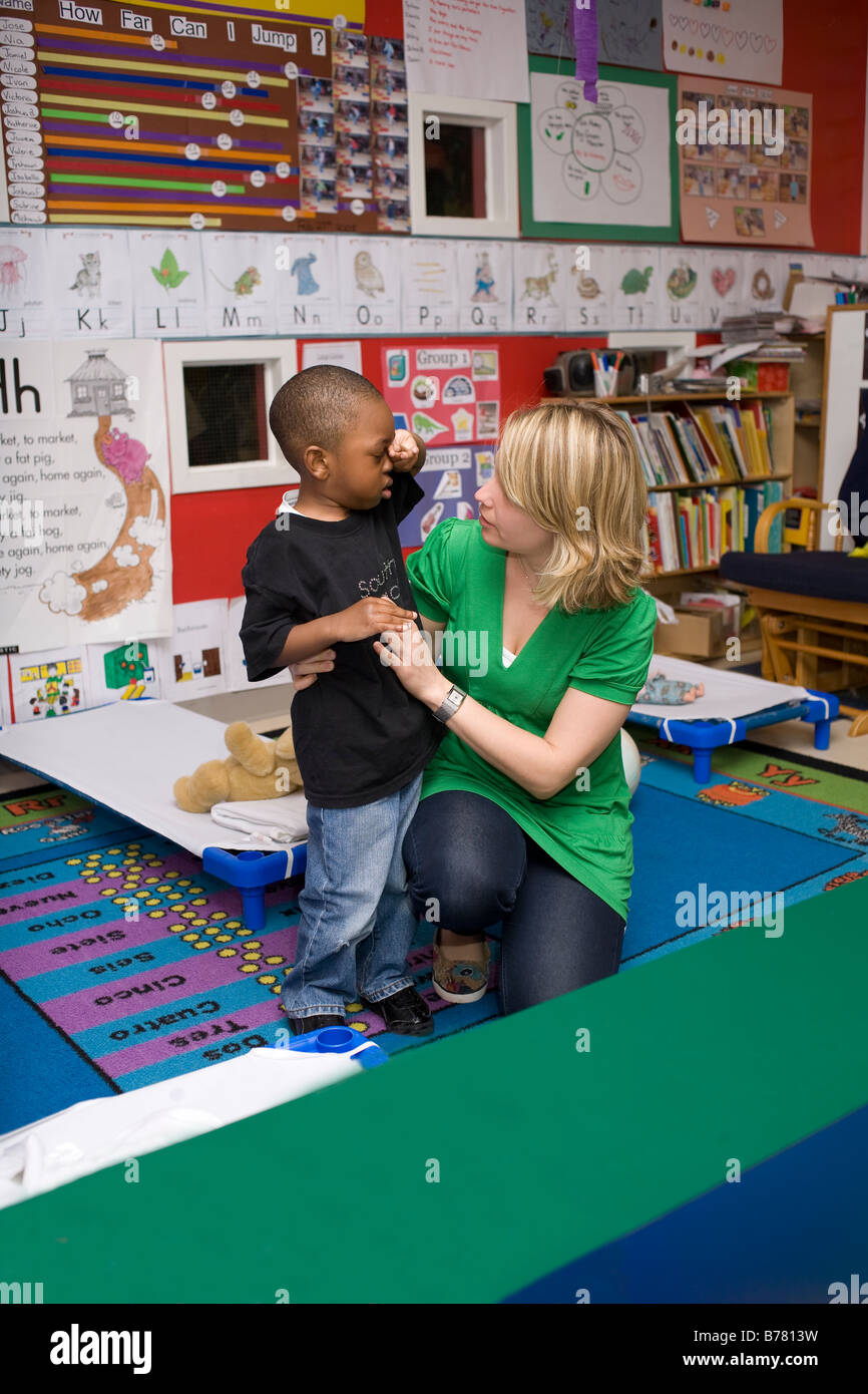 Teacher student comforting hi-res stock photography and images - Alamy