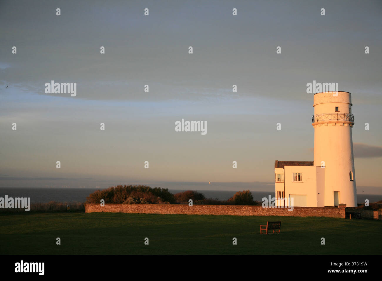 Lighthouse at Dusk Stock Photo - Alamy