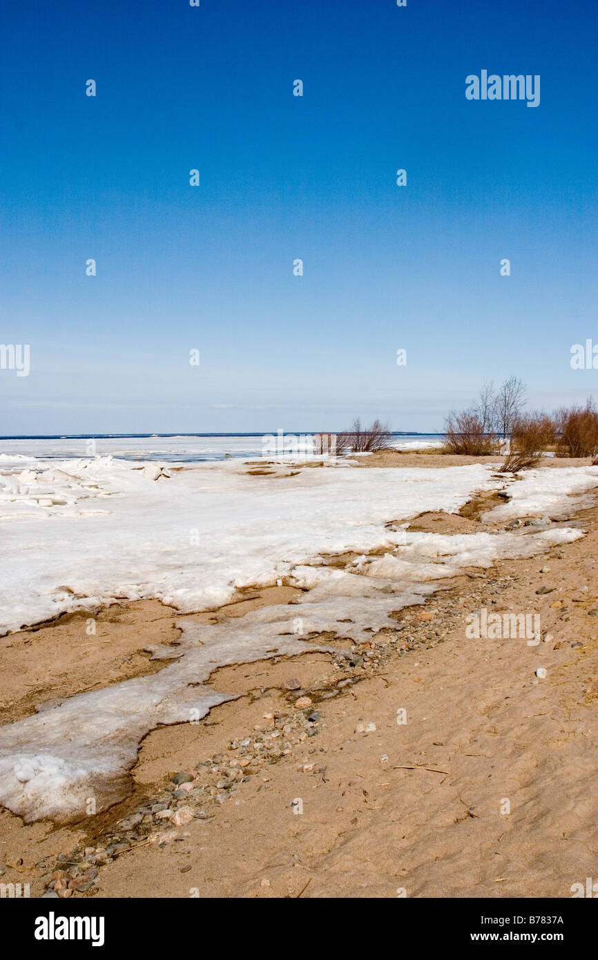 a frozen spring shoreline Stock Photo - Alamy