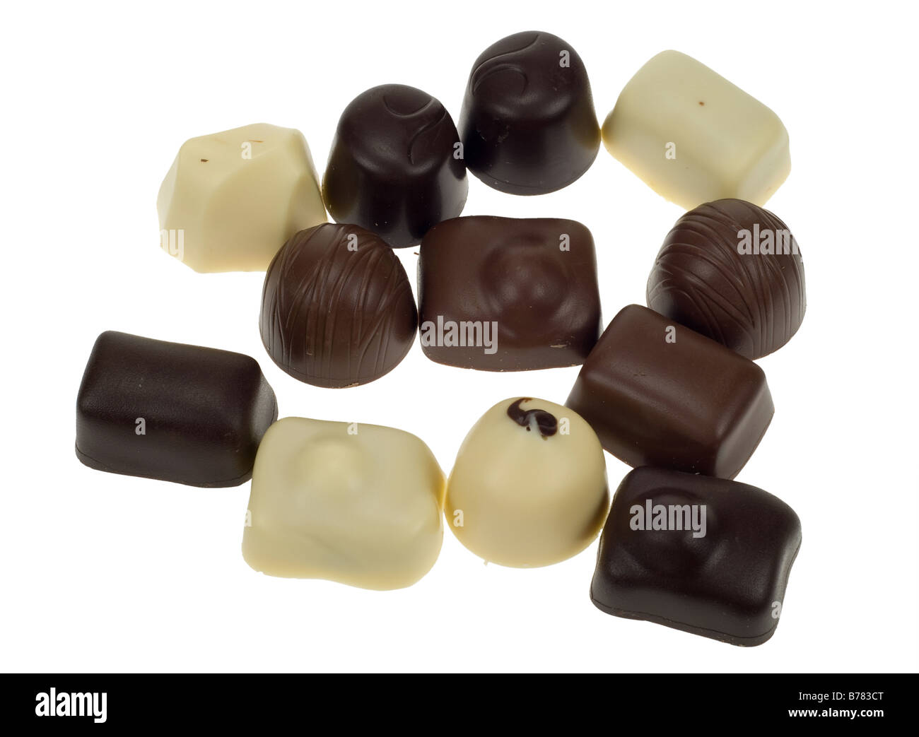 lots of belgian pralines isolated on a white background Stock Photo - Alamy