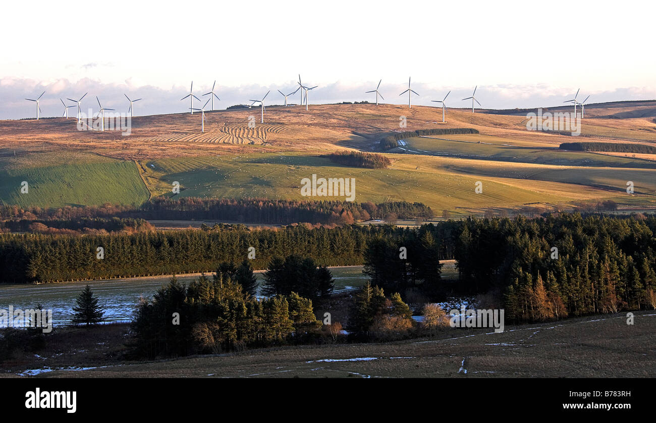 Landscape looking across valley to hills with wind farm hi-res stock ...