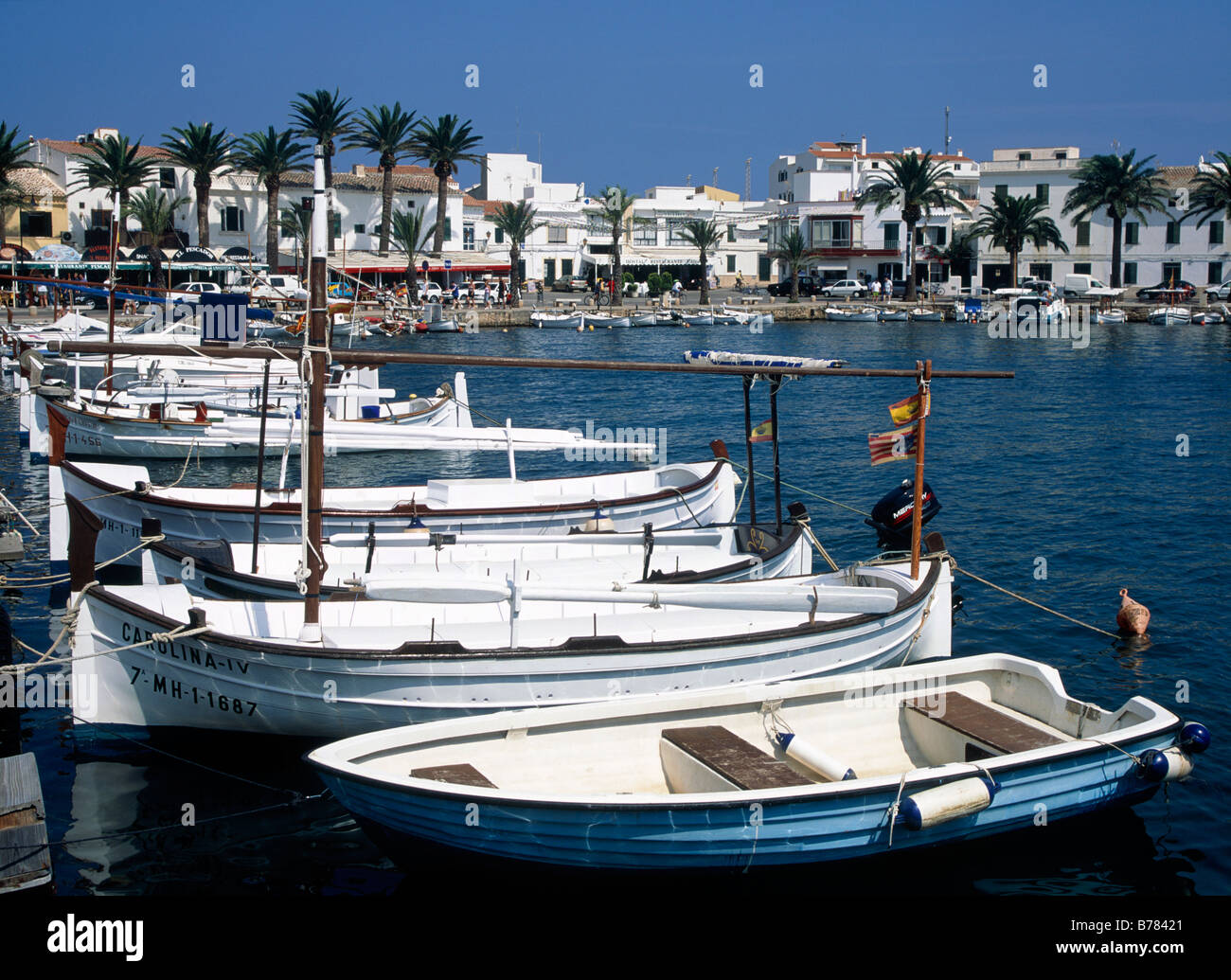 Harbour Boats moored View to houses on waterfront FORNELLS MENORCA ...