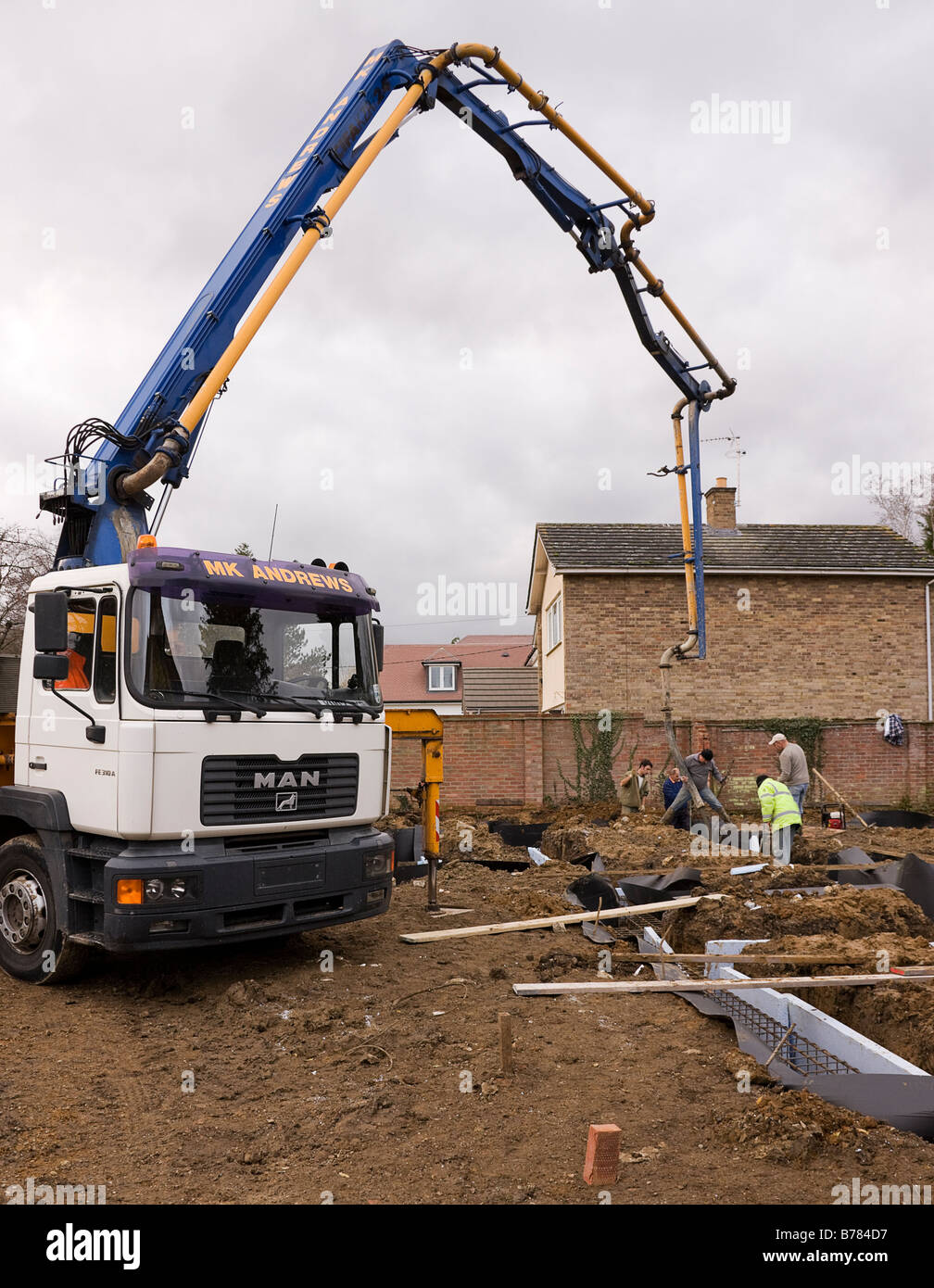 Pumping cement into the footings hi-res stock photography and images ...