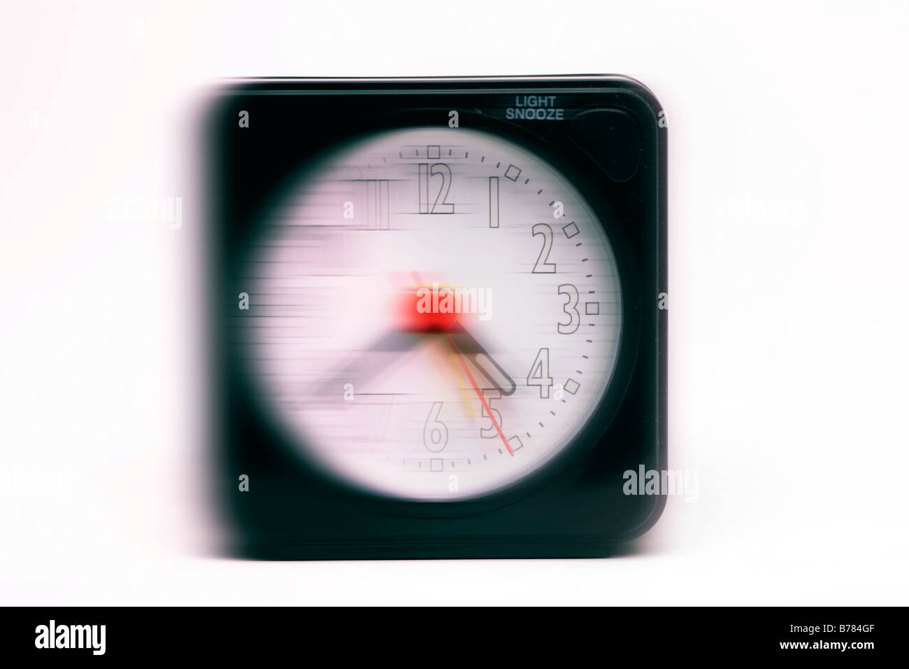 Alarm clock, blurred, studio shot, white background Stock Photo - Alamy