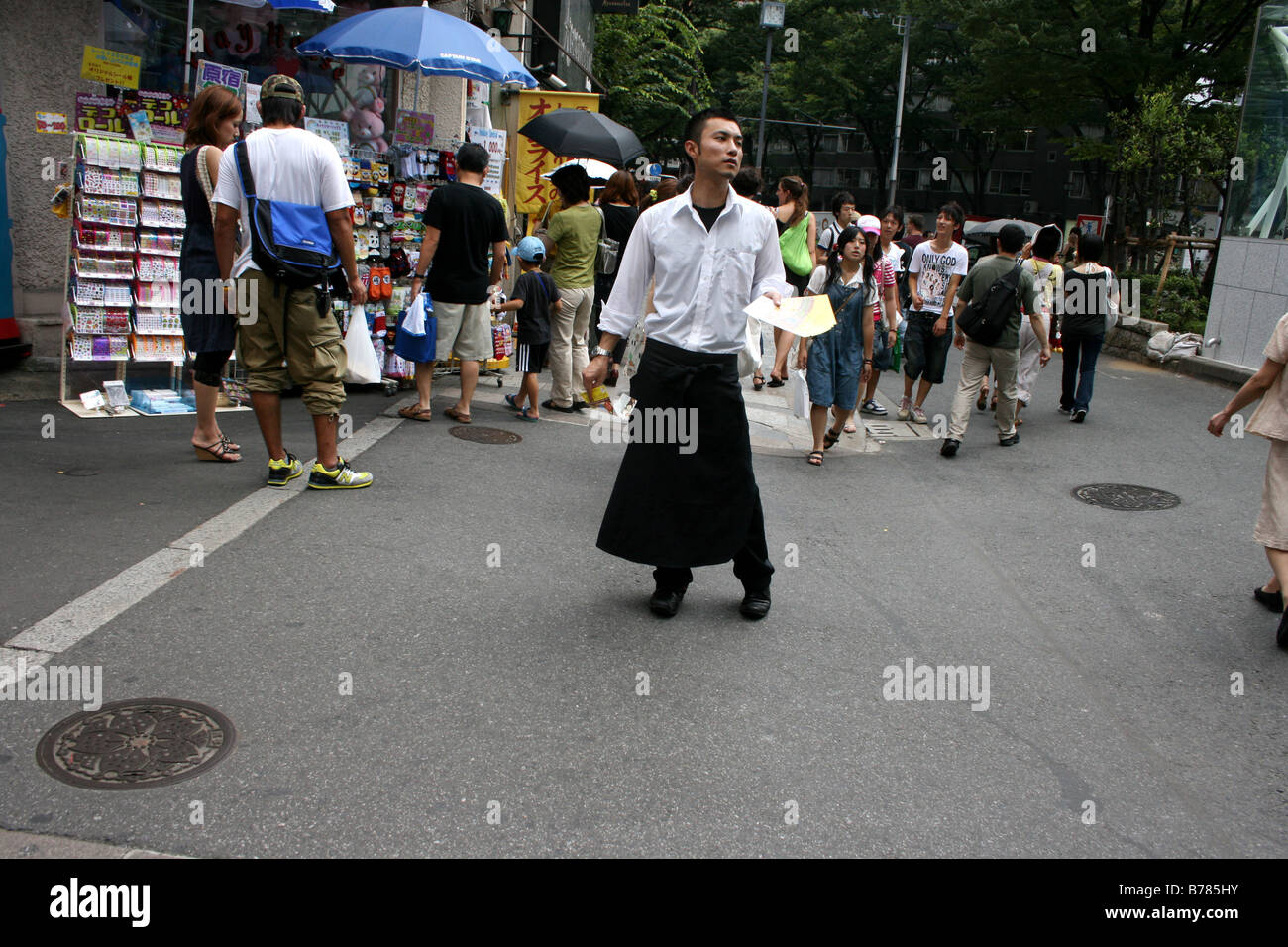 Handing out flyers hi-res stock photography and images - Alamy