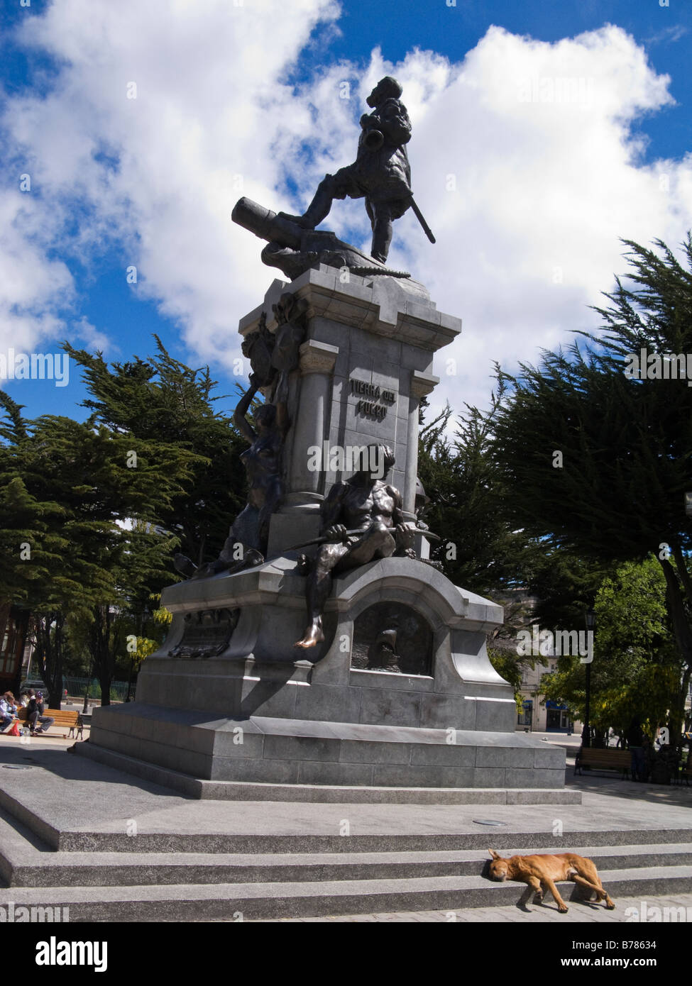 Statue of Fernando de Magellanes and yellow dog in Punta Arenas, Chile ...