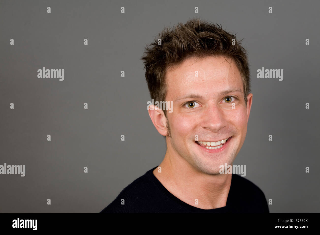 Young man smiling, portrait Stock Photo - Alamy