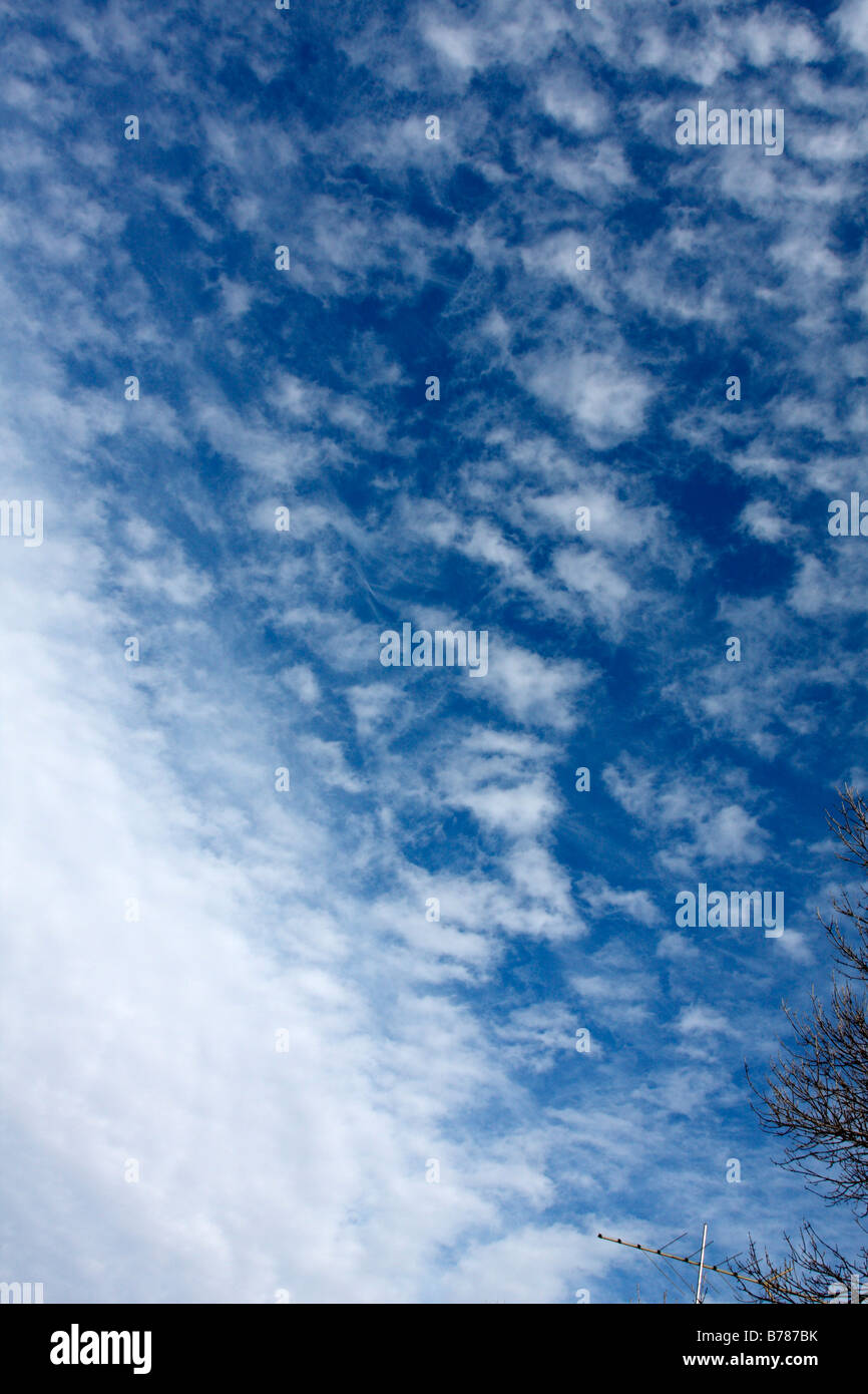 High clouds with a touch of blue sky and a diagonal division between ...