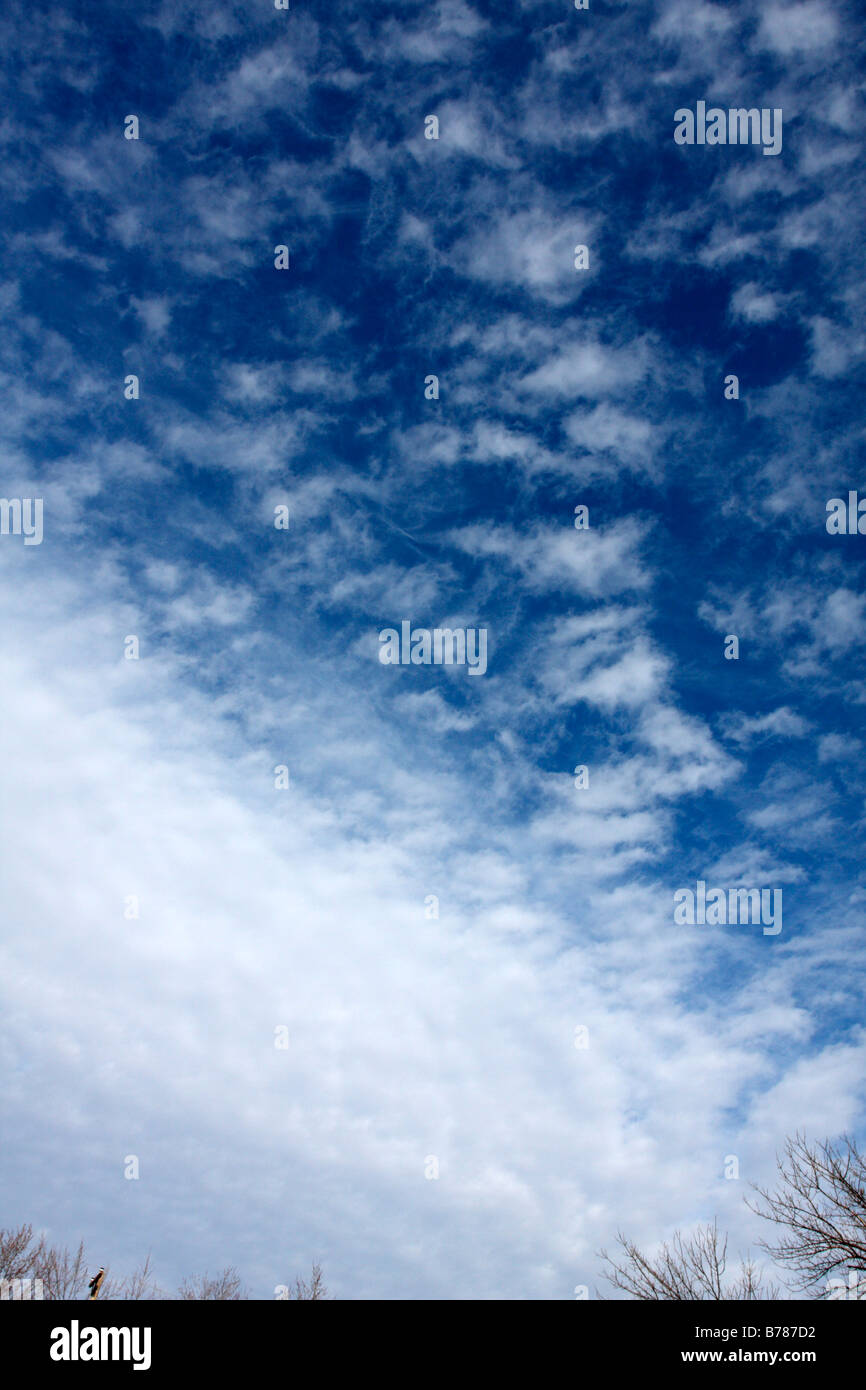 High clouds with a touch of blue sky and a diagonal division between ...