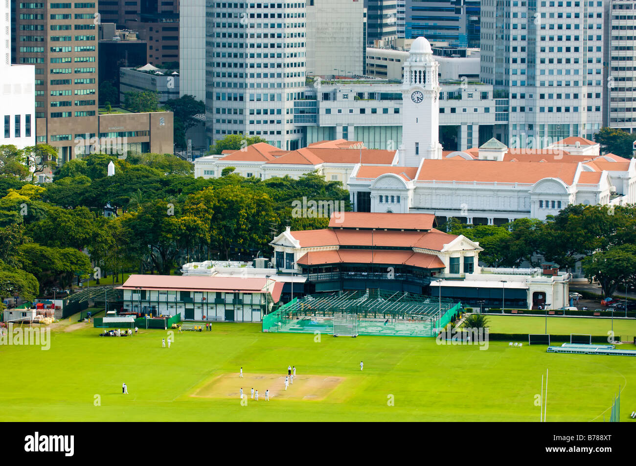 Central Padang in Singapore with the financial district behind Stock ...