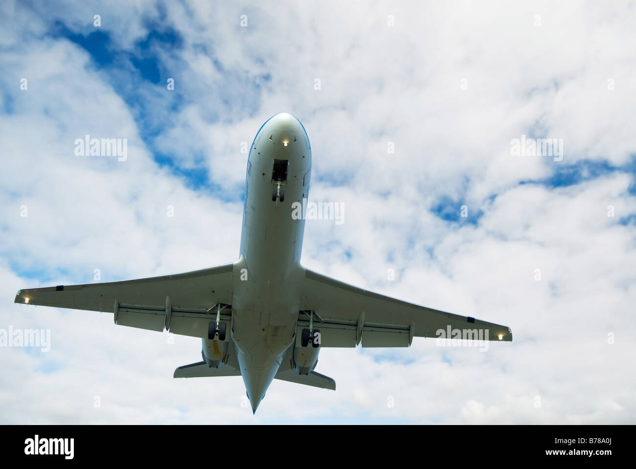 passenger plane from underneath Stock Photo - Alamy
