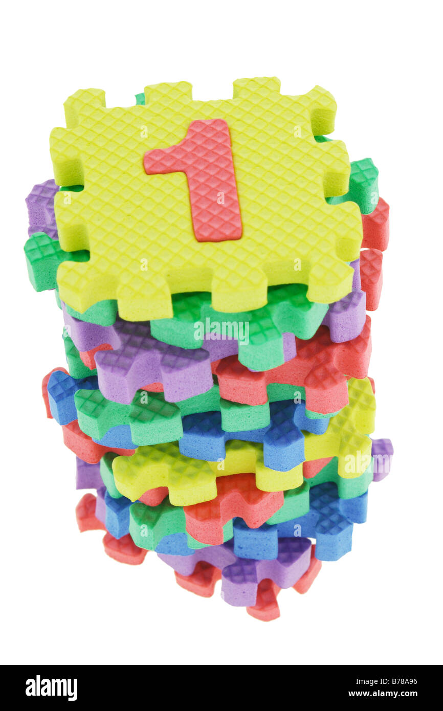 Stack of puzzle blocks with number 1 on top on white background Stock ...