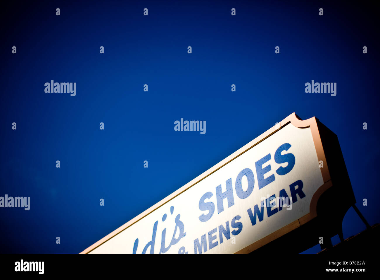 A vintage shoe store sign and blue sky in Sonoma, California Stock ...