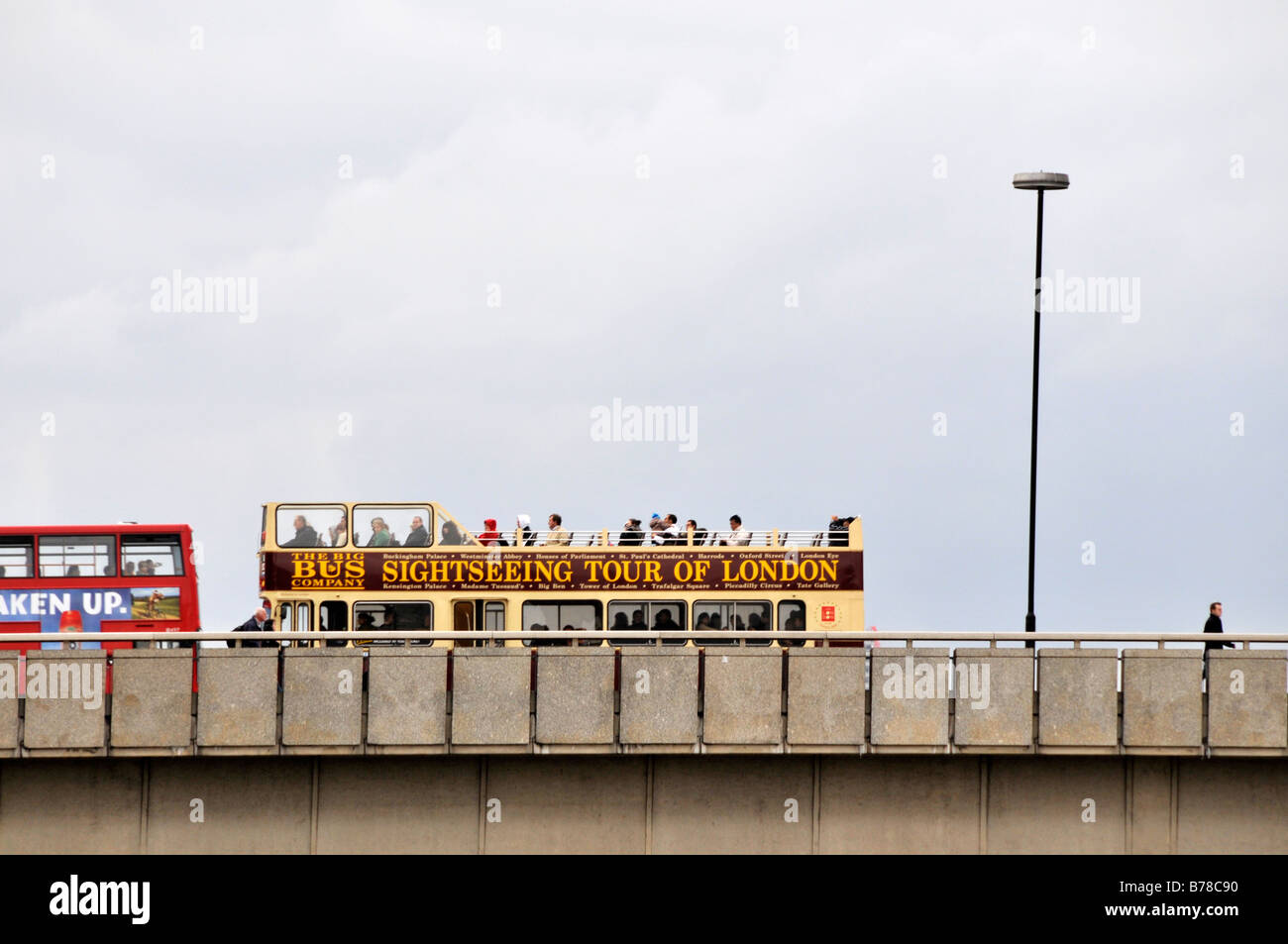 Sightseeing bus - tour of London moving through EC4 London Bridge Stock ...