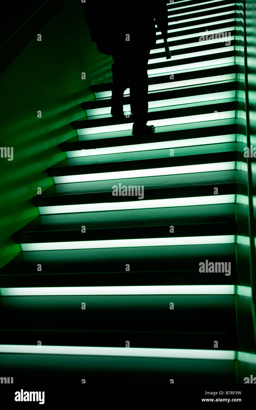 Man walking up stairs, low section Stock Photo - Alamy