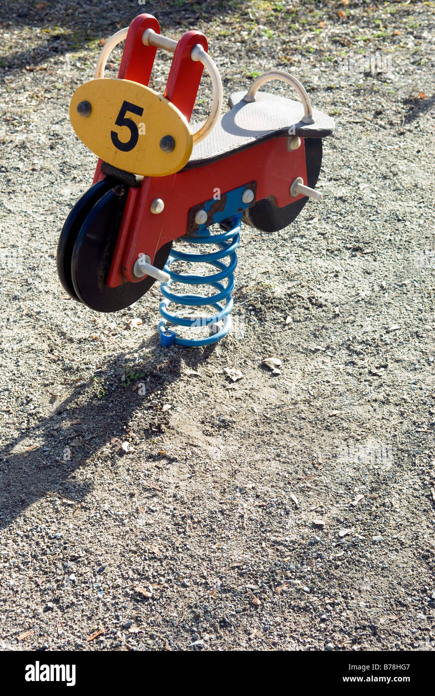 Playground spring rocker High Resolution Stock Photography and Images ...