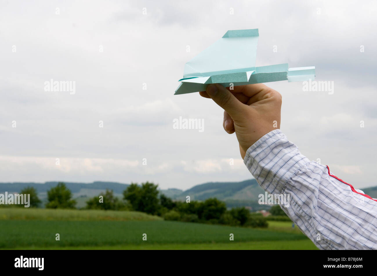 Hands holding paper planes hi-res stock photography and images - Alamy