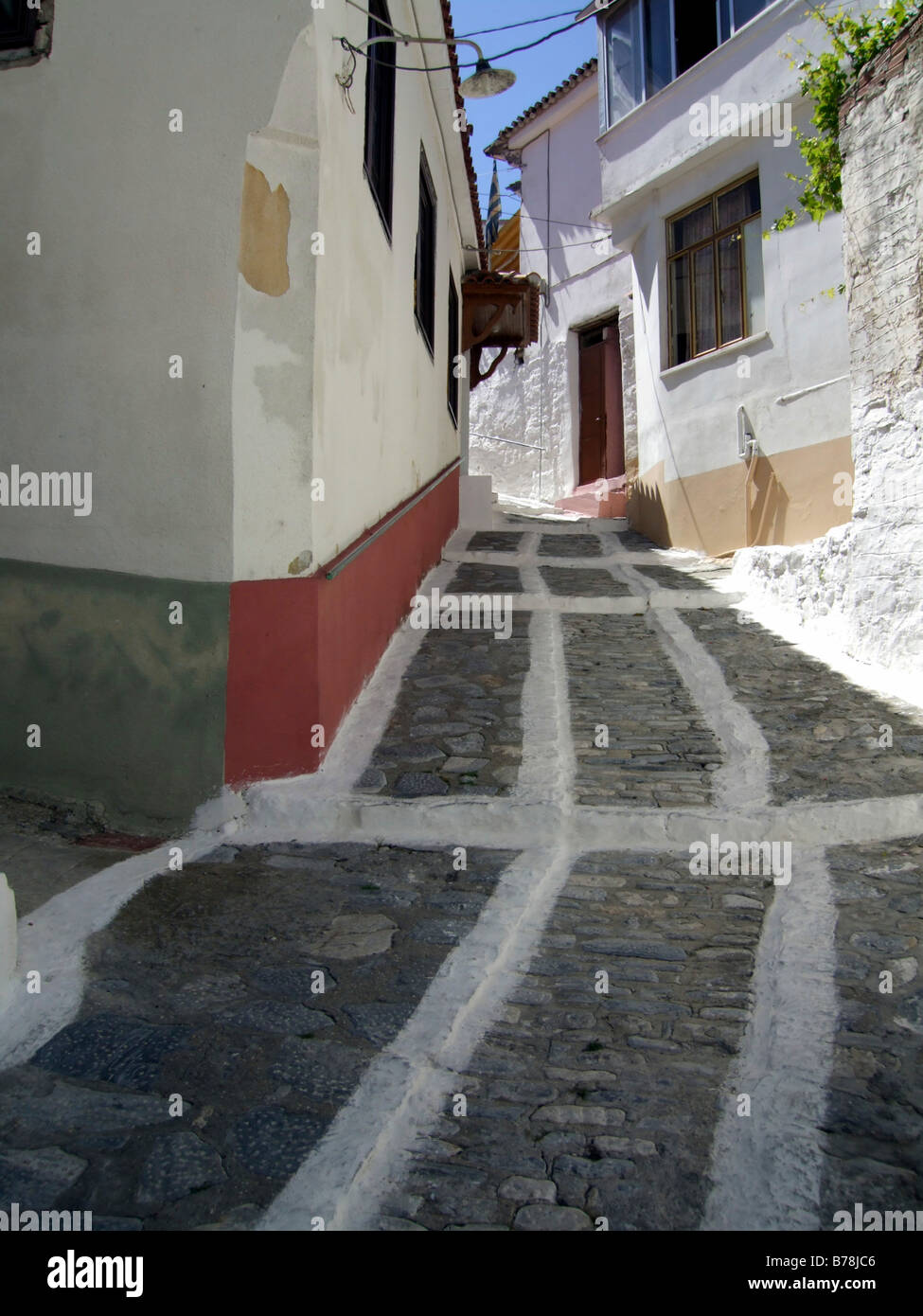 Deserted alley in the historic centre of the city of Samos, Vathy ...