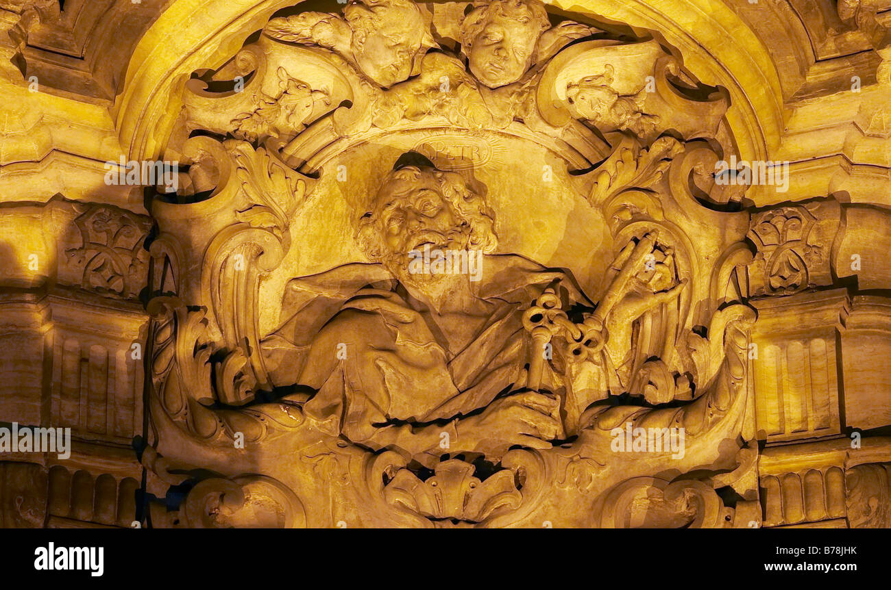 Shot of the architectural detail - baroque relief Saint Peter - night ...