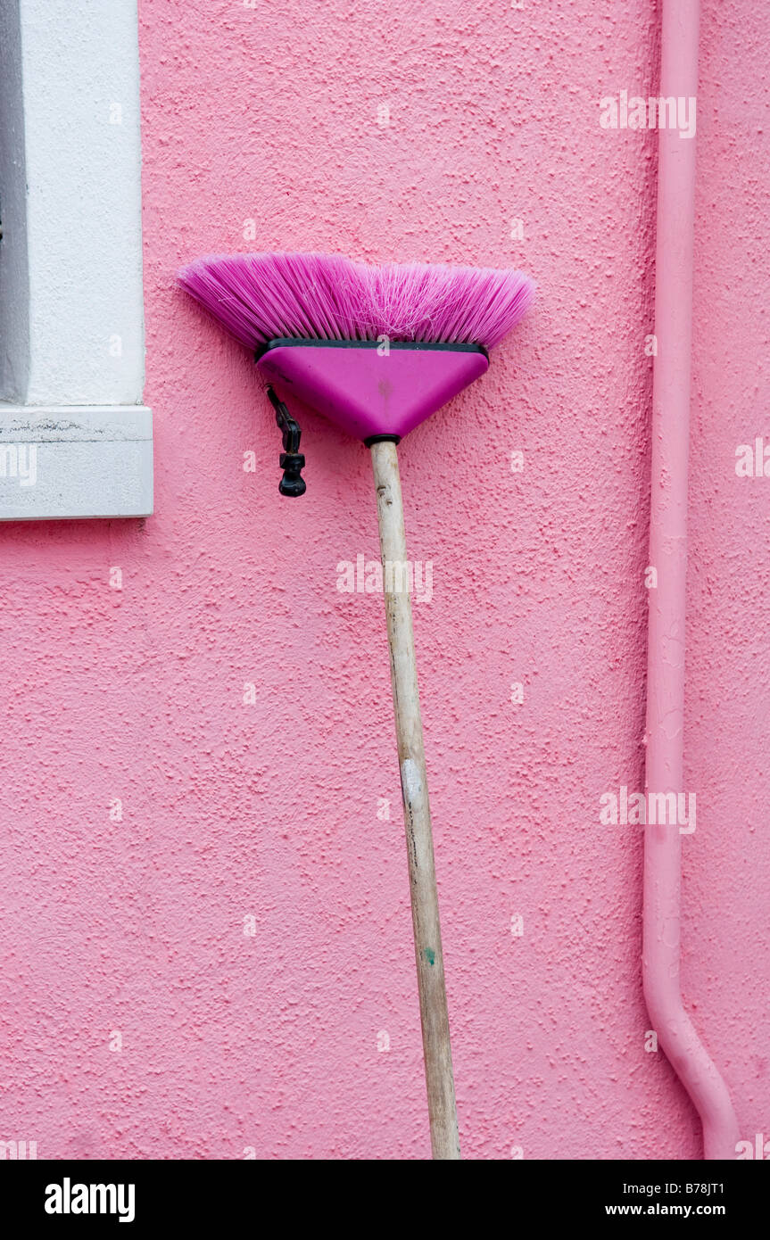 Italy, Venice, Broom leaning on a wall Stock Photo - Alamy