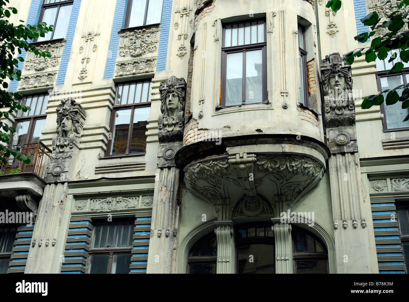 Art Nouveau facade with sculptures of faces in Alberta iela street ...