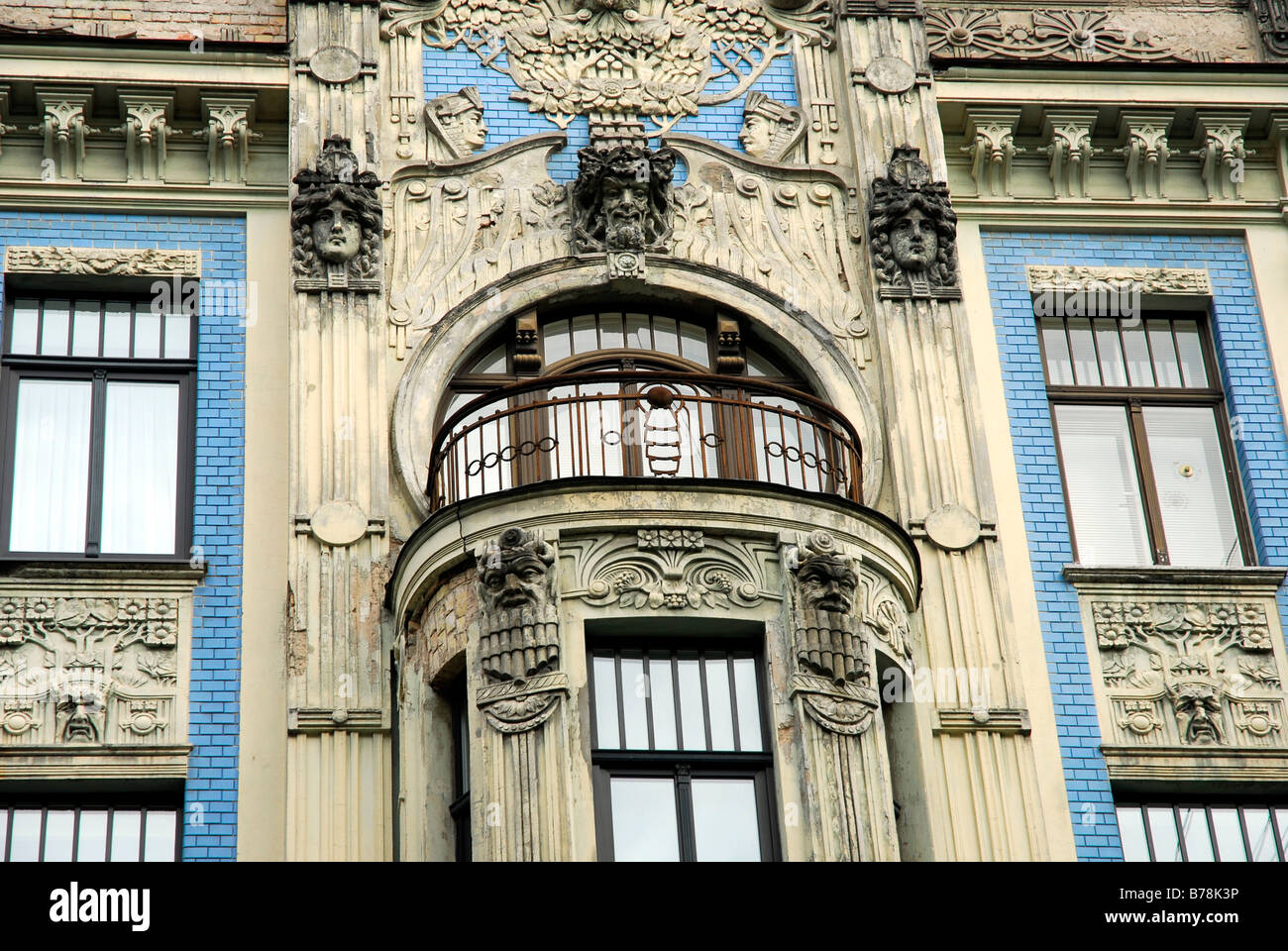 Art Nouveau facade with sculptures of faces in Alberta iela street ...