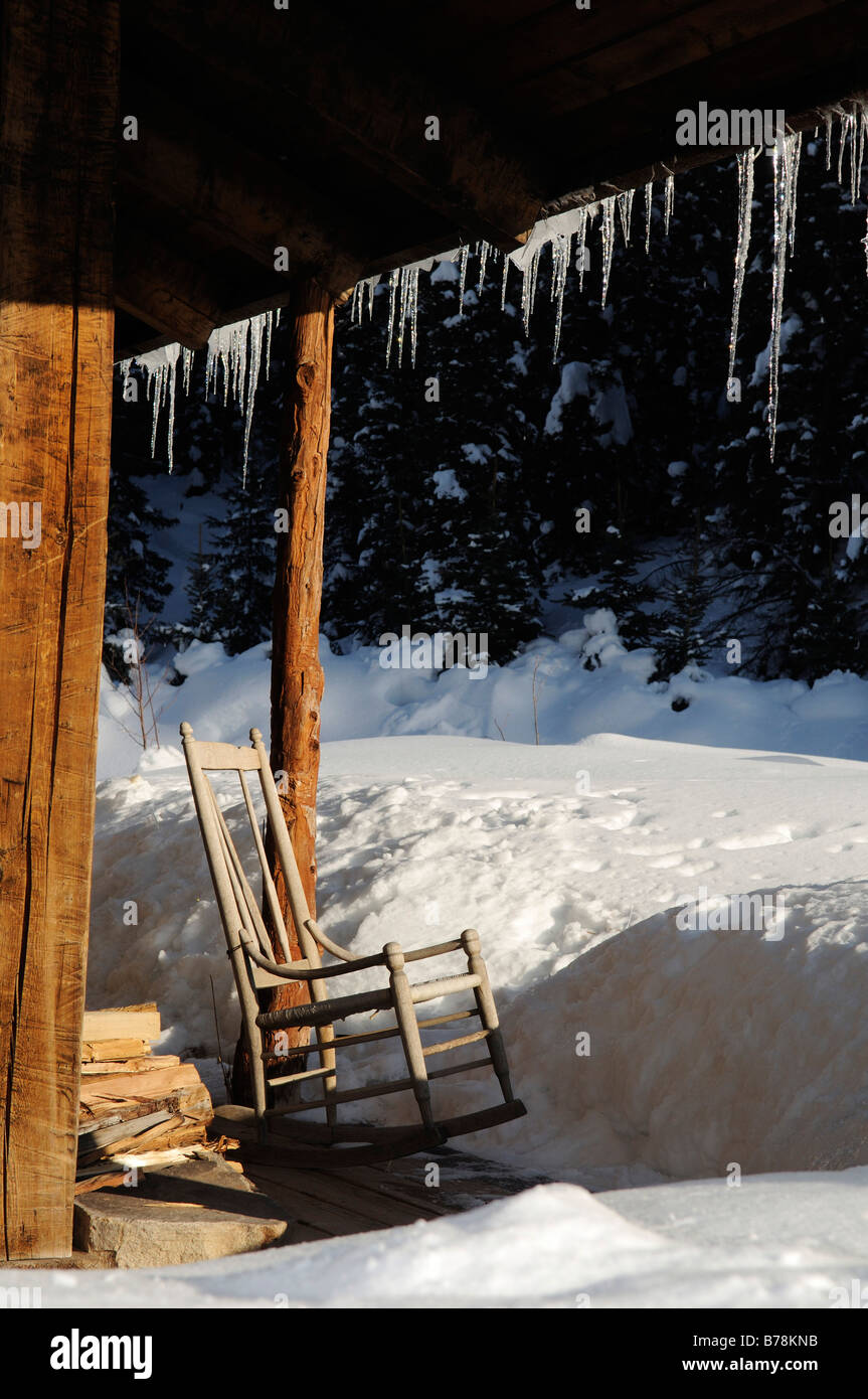 Old lodge with rocking chair, icicles, Dunton Hot Springs Lodge ...