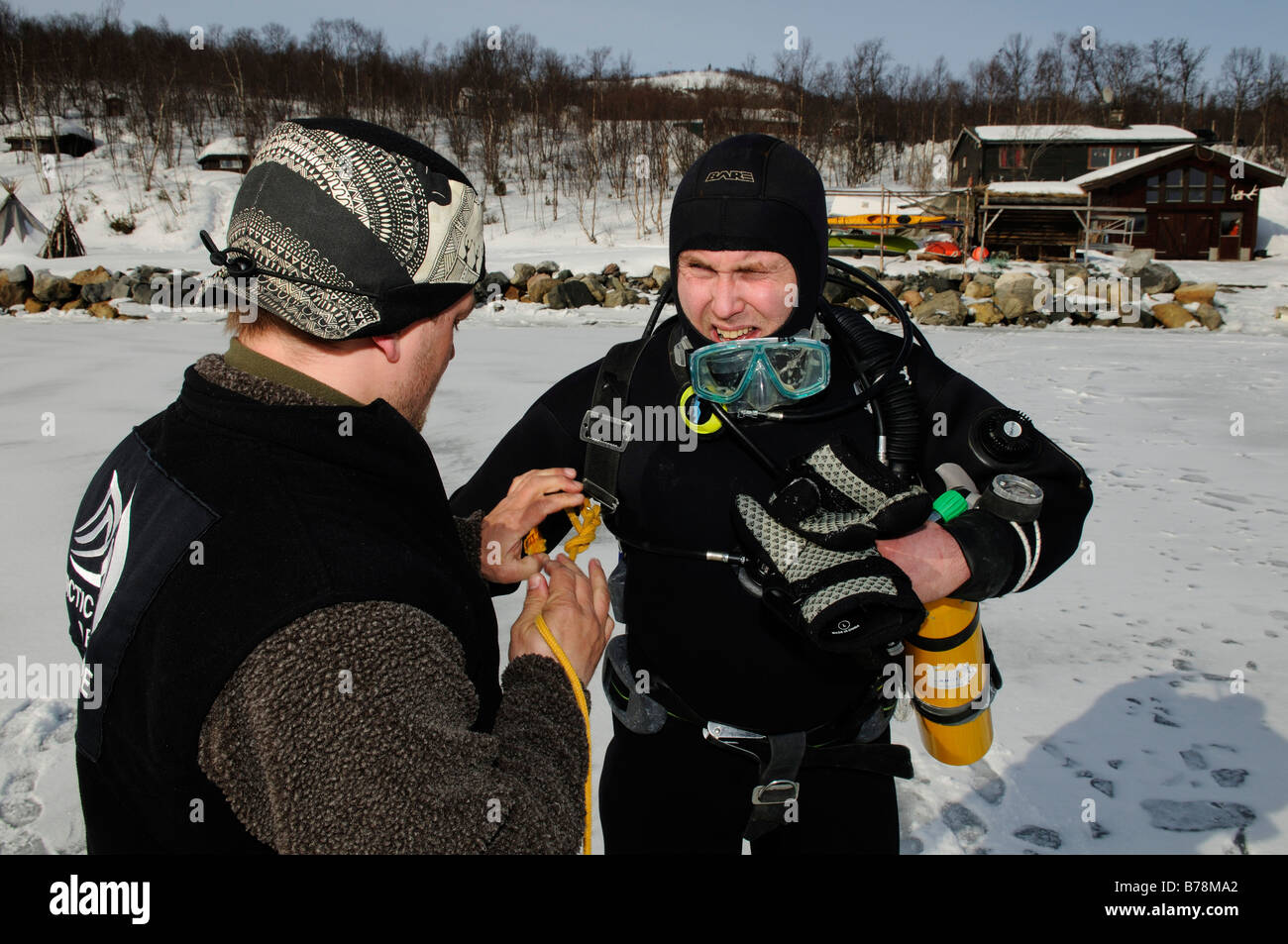 Scuba diver before diving in the fjord for king crabs, Kirkenes ...