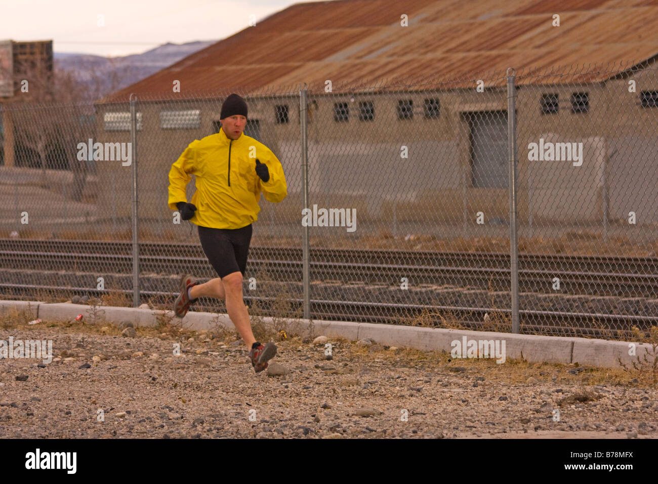 A man running near train tracks in Reno in Nevada Stock Photo - Alamy