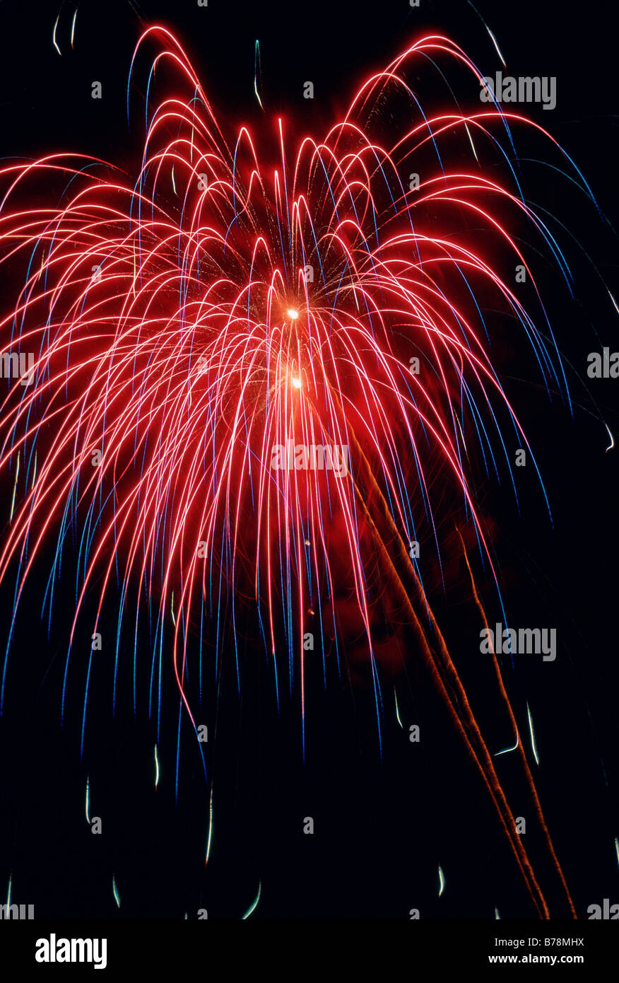 A double burst of fireworks in the sky during the Fourth of July ...